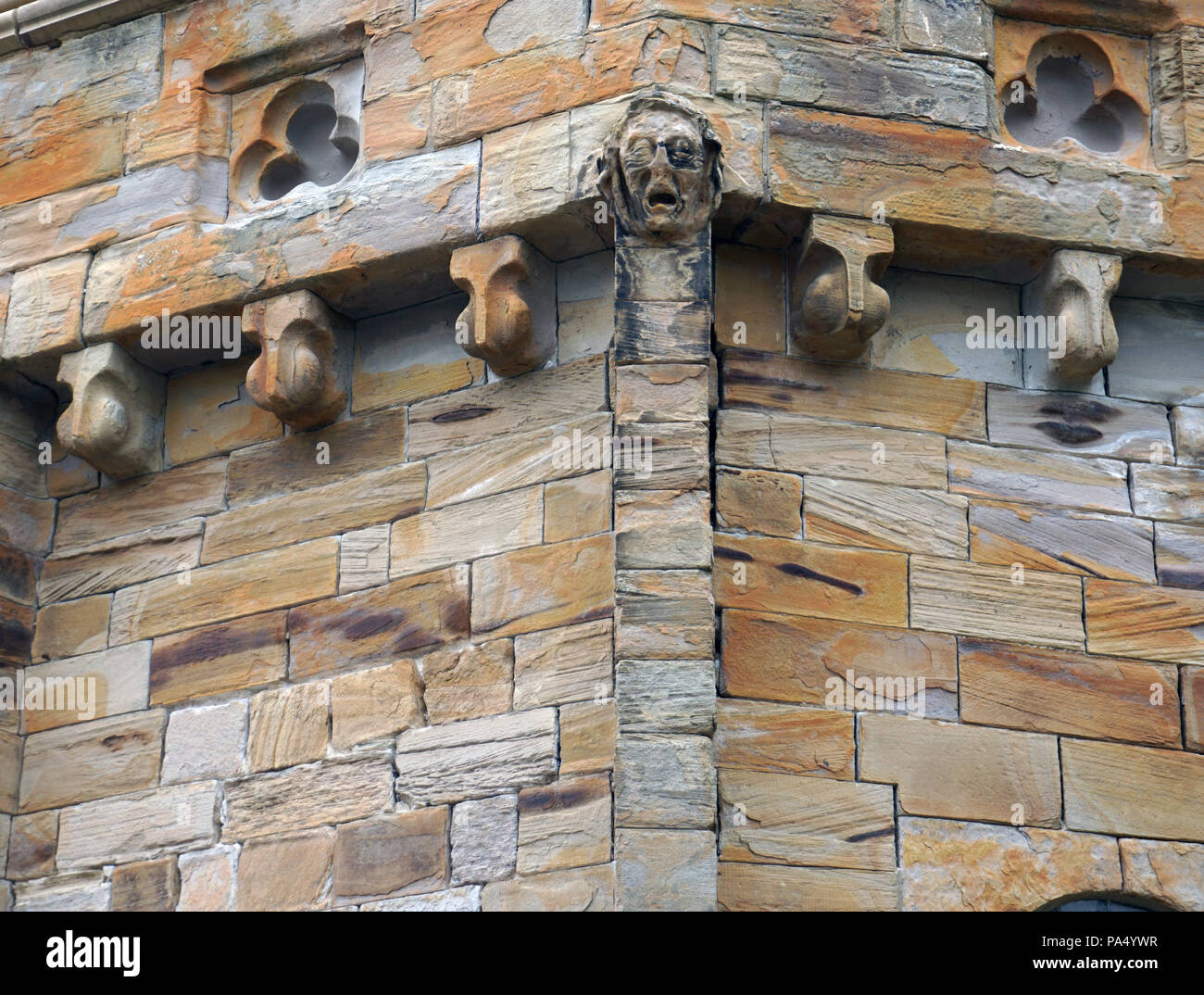 Old tower with gargoyles on the grounds of Durham Cathedral England ...