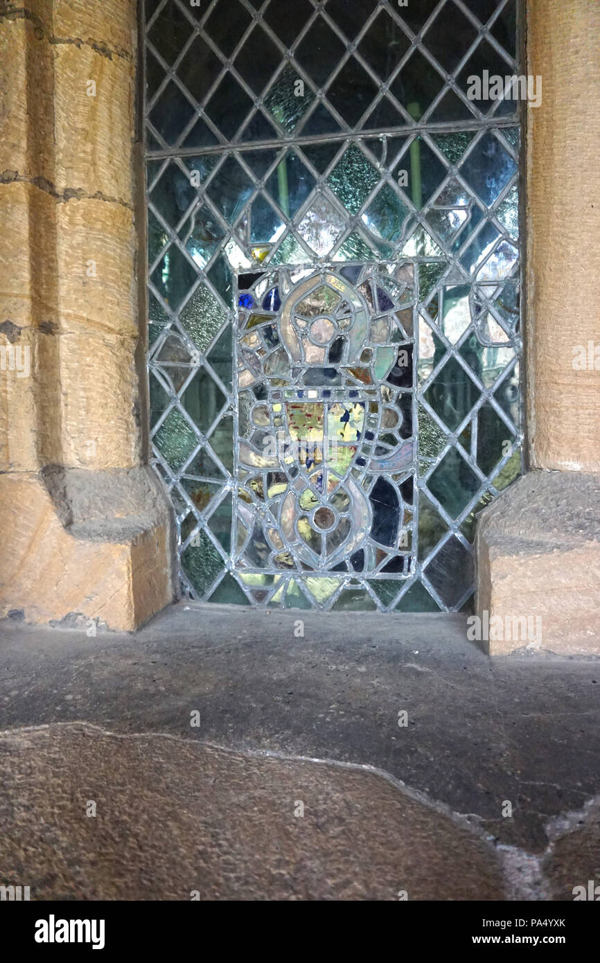 Exterior view of an old stained glass leaded window Stock Photo - Alamy