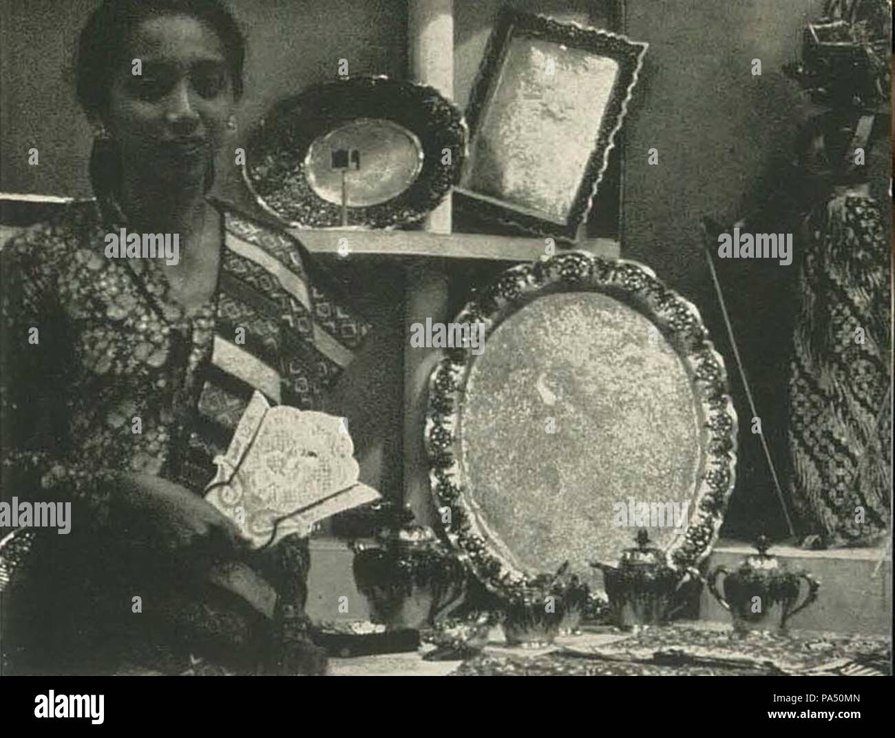 332 Woman with silverware, Wanita di Indonesia p97 (Ministry of ...