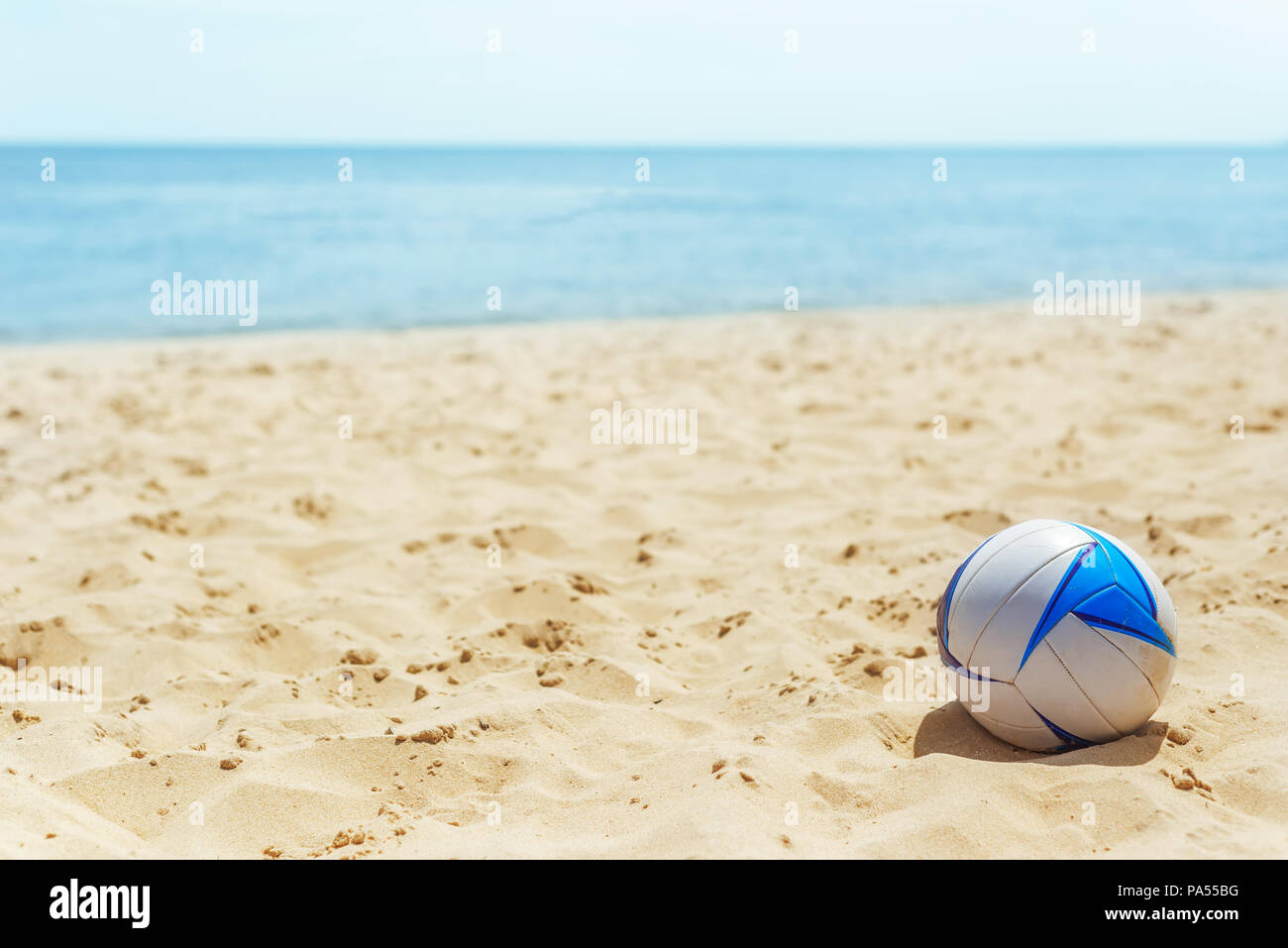 ball on beach near blue sea. soft focus on bottom of the picture Stock ...