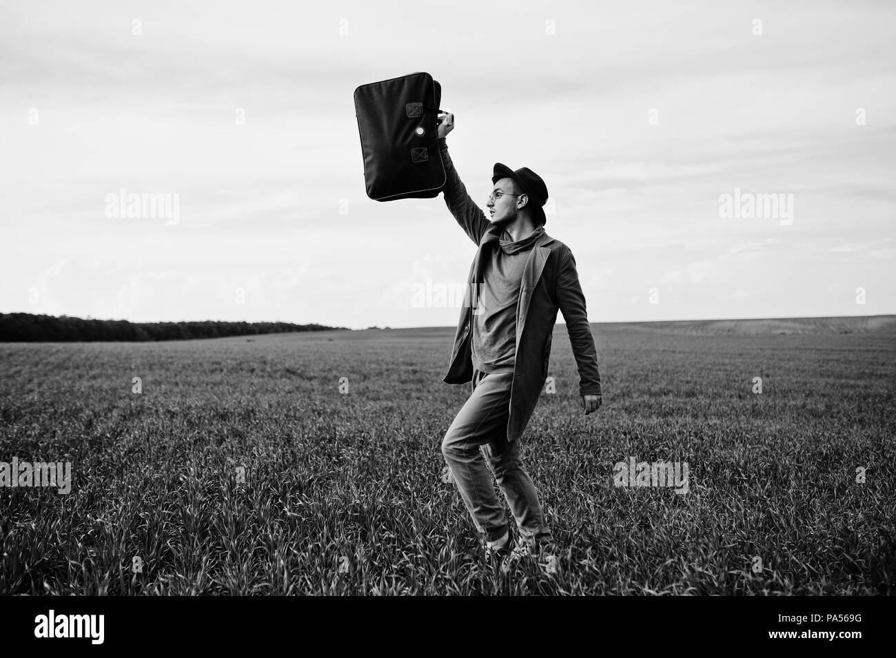 Man in glasses orange Black and White Stock Photos & Images - Alamy