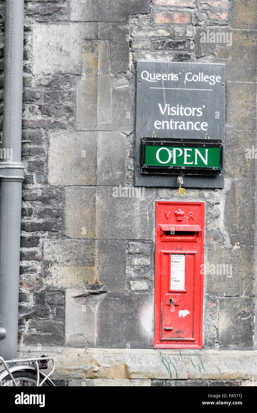 Red wall post box next beside the visitors' entrance to Queen's college ...