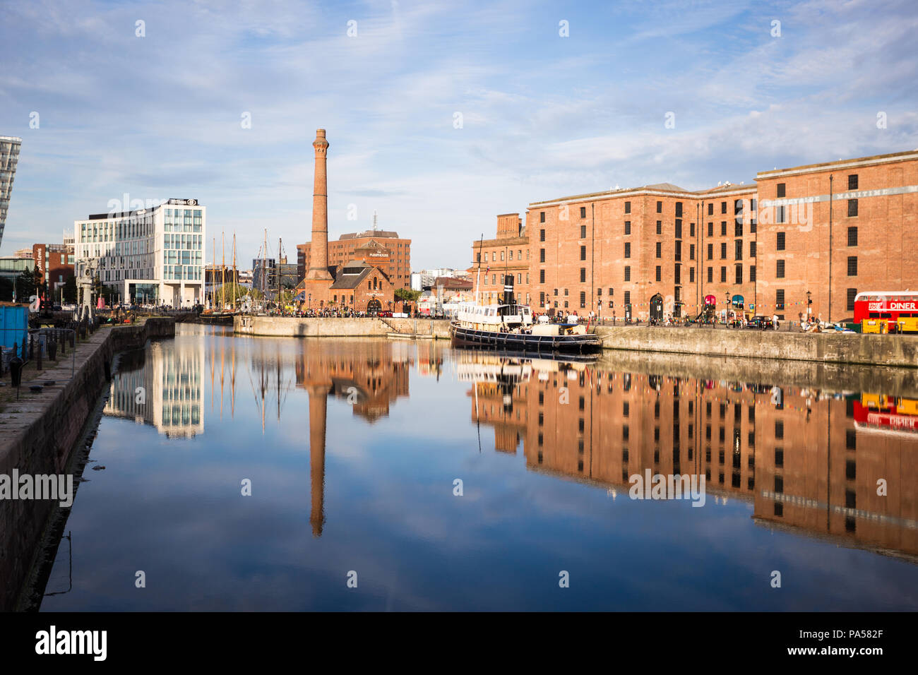 Liverpool Waterfront with water reflection of the Albert Dock, Pump ...
