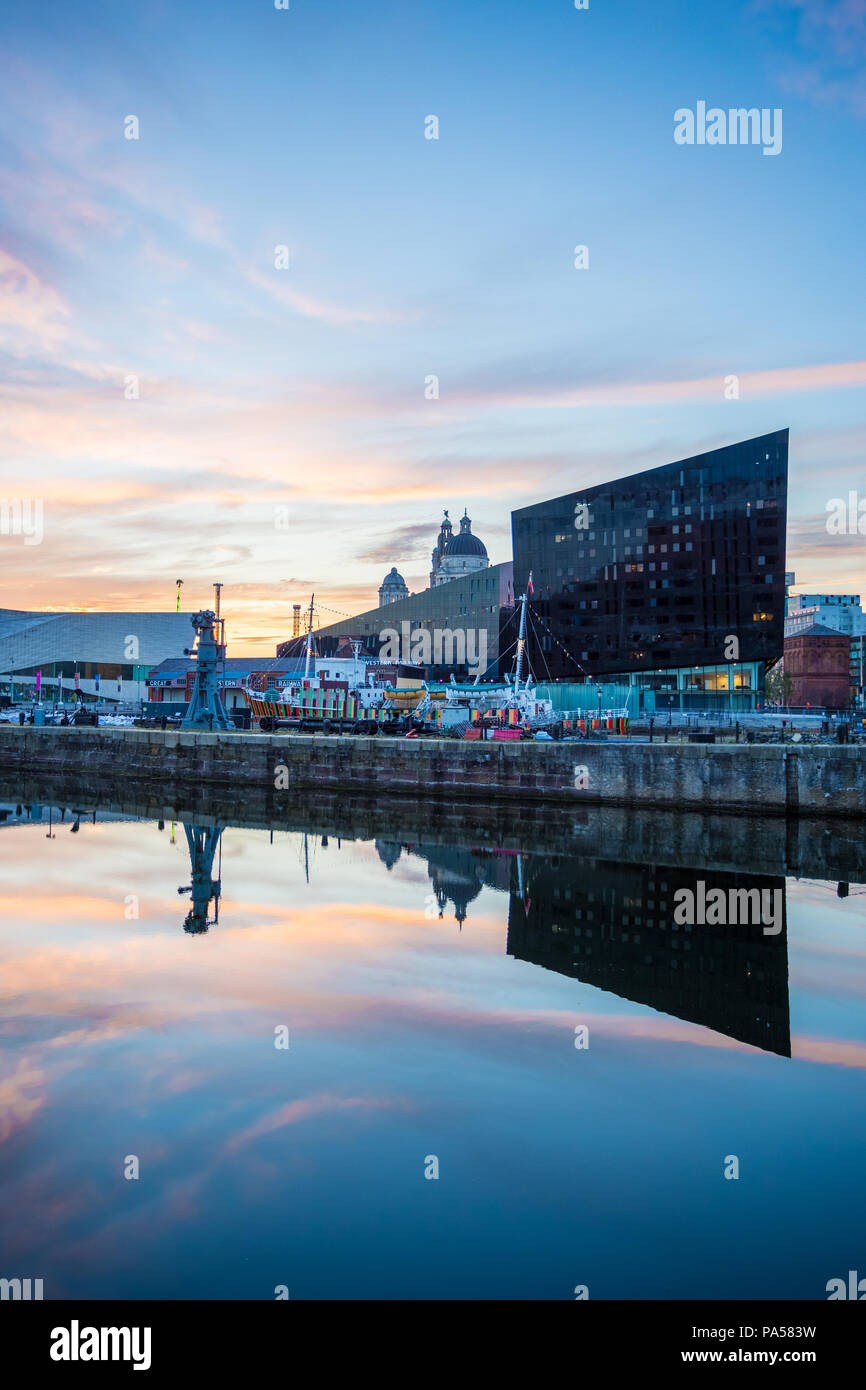 Dusk shot of Liverpool Waterfront, showing water reflection of Mann ...