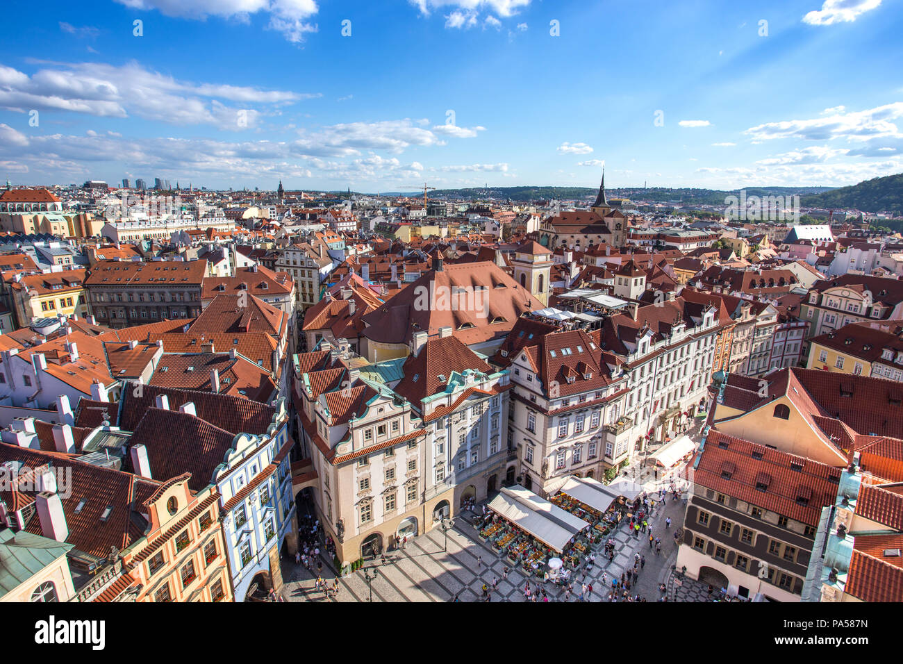 Prague old town square with old church and castle in shopping street ...