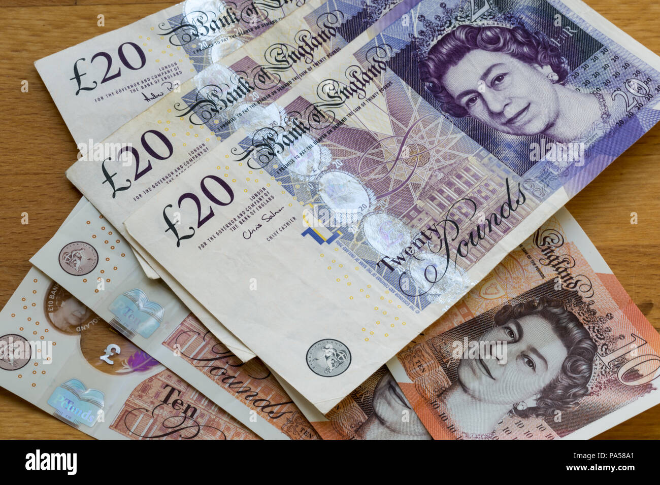 Money on counter uk hi-res stock photography and images - Alamy
