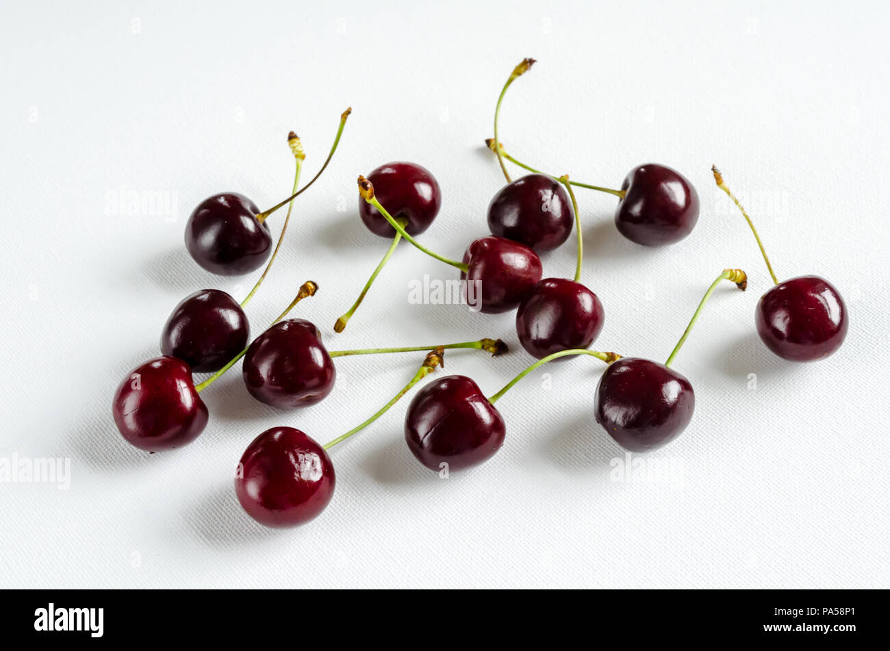A Studio Photograph of Black Cherries Stock Photo - Alamy