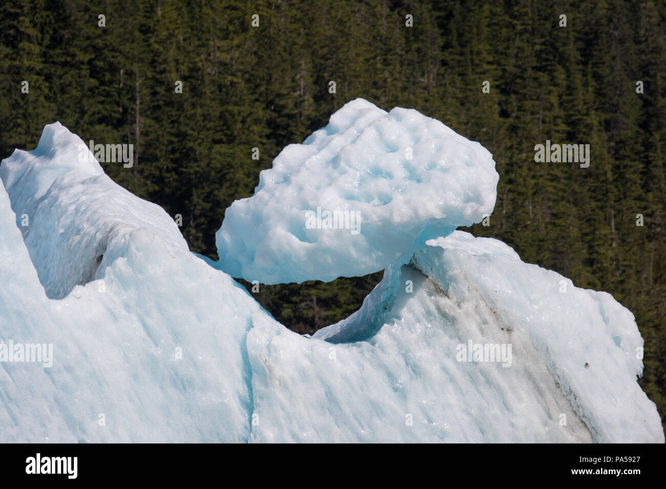 Balanced ice on iceberg Stock Photo - Alamy