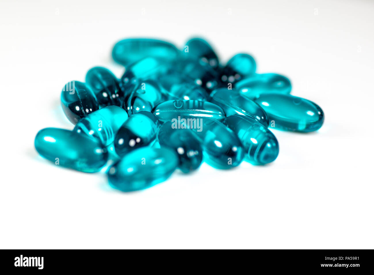 Blue capsules hi-res stock photography and images - Alamy