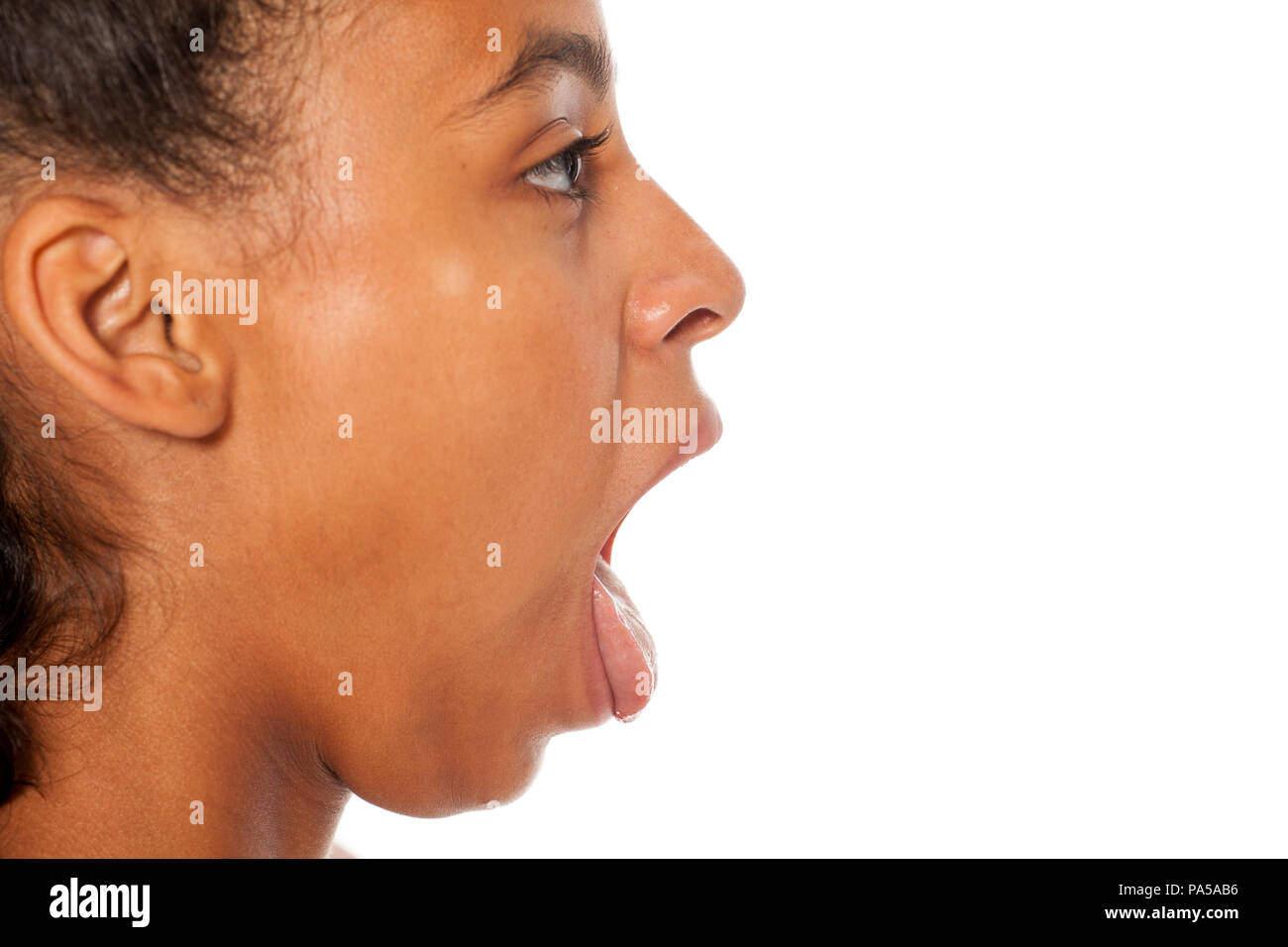 Profile Of Beautiful Dark Skinned Girl With Open Mouth And Tongue Out