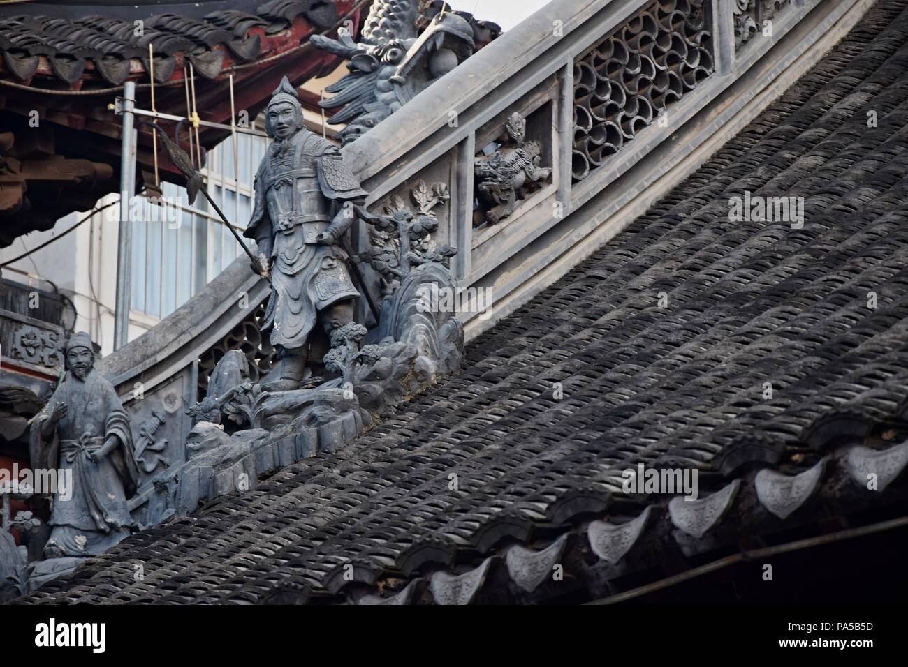 The pottery ridge on the roof of Chinese ancestral hall under ...