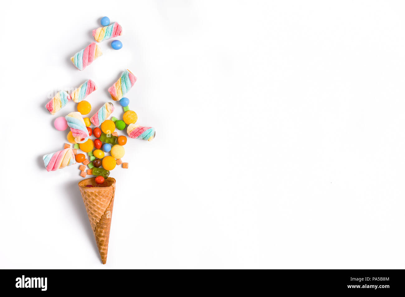 Flat lay candies party Cut Out Stock Images & Pictures - Alamy