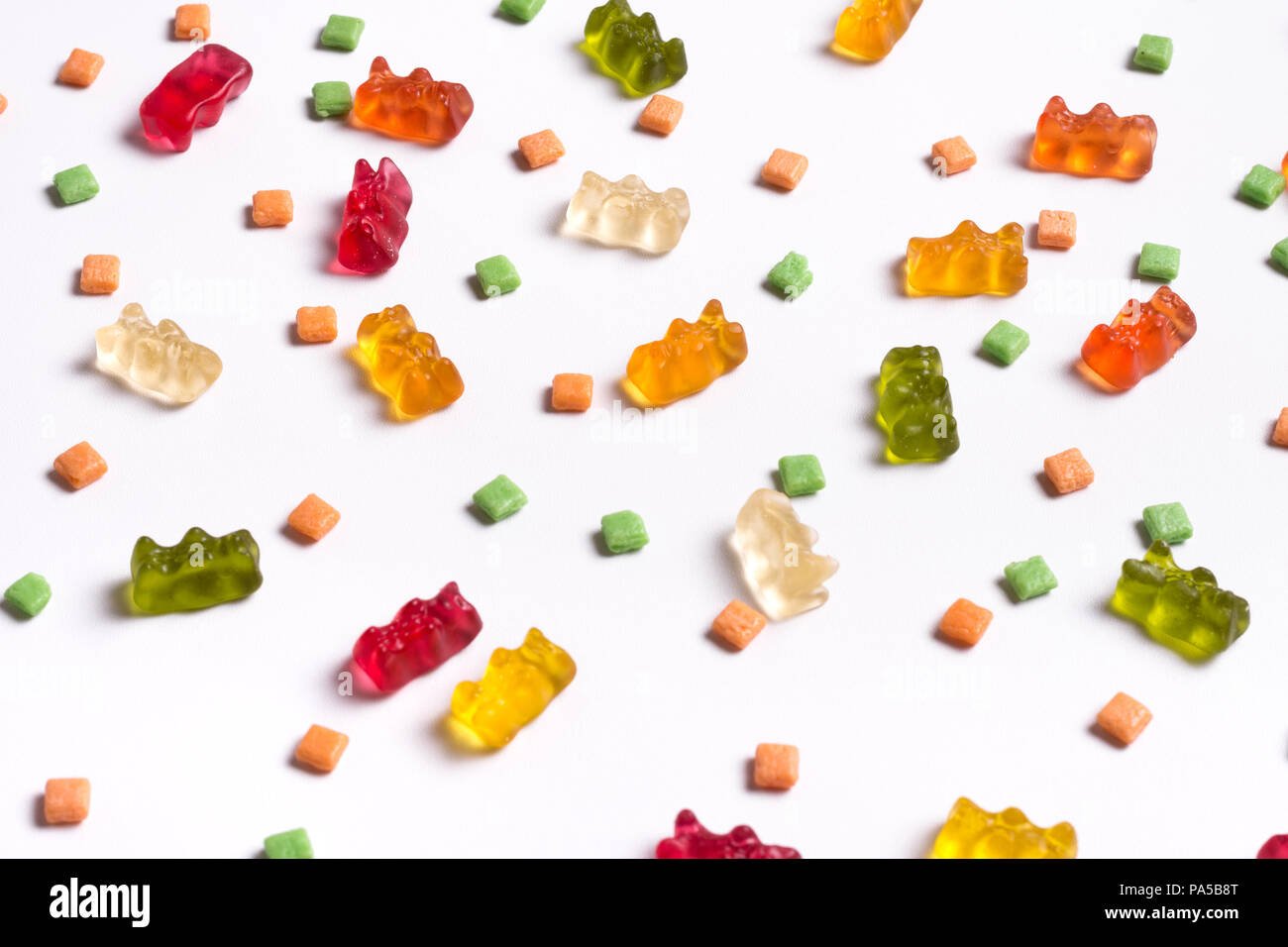 Assorted sweets flat lay background on white Stock Photo - Alamy