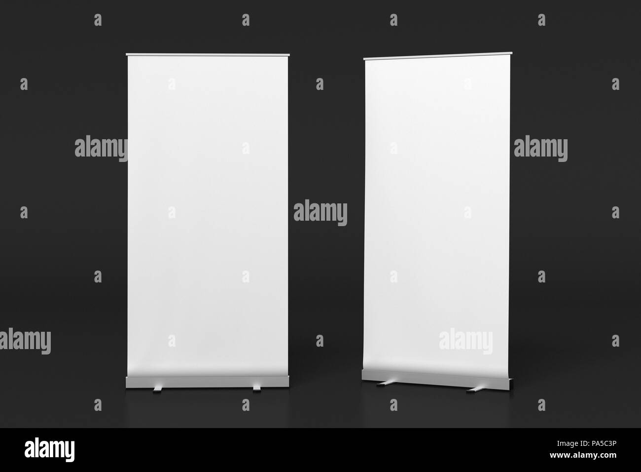 Two blank roll up banner stands isolated on black. Include clipping ...