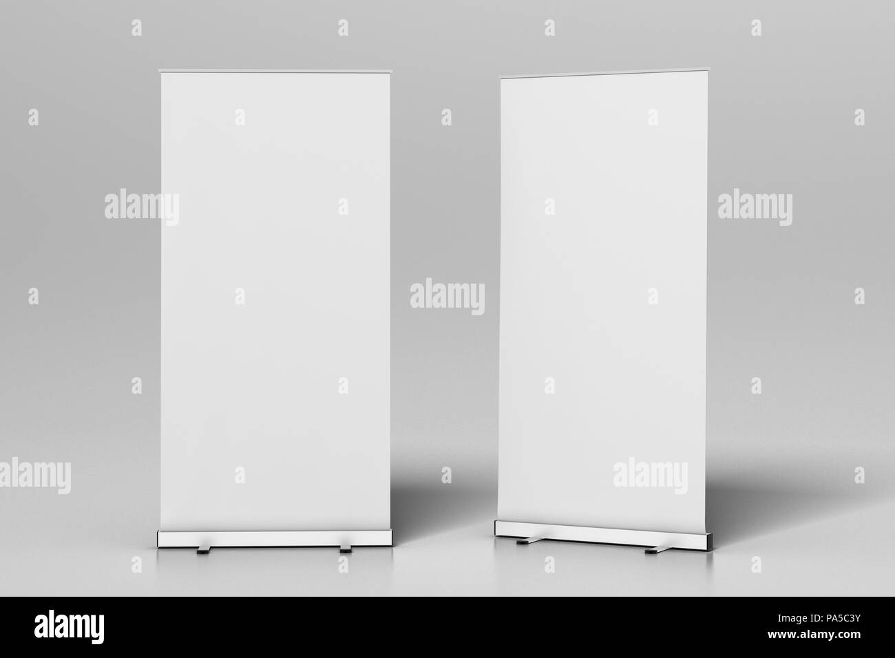 Two blank roll up banner stands isolated on white. Include clipping ...