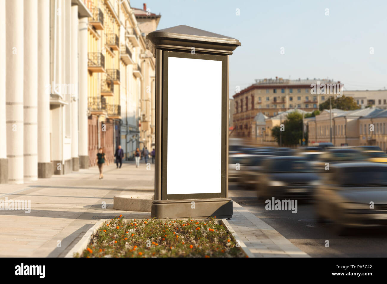 Blank vertical street advertising pillar with city background Stock ...
