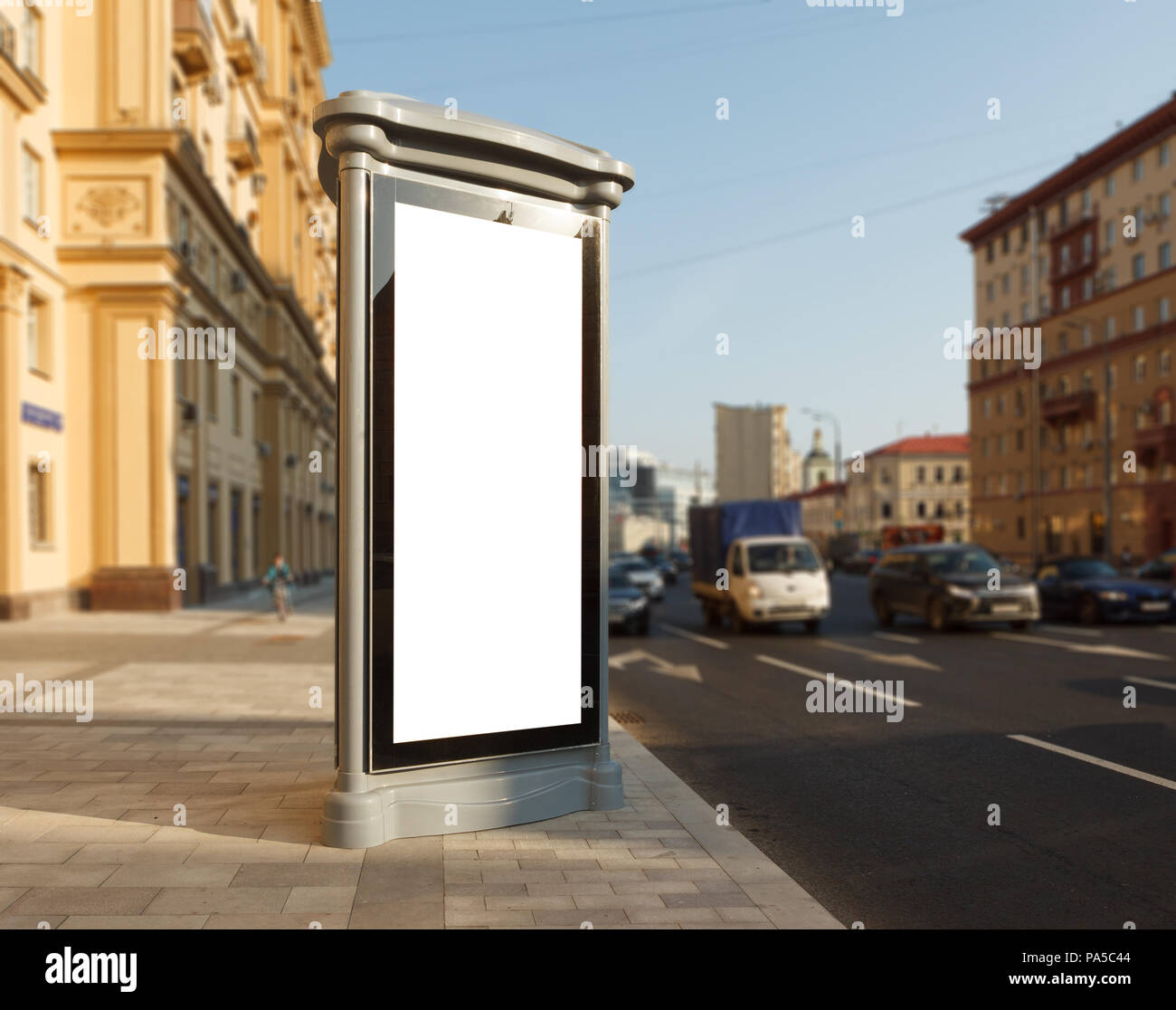 Blank vertical street advertising pillar with city background Stock ...