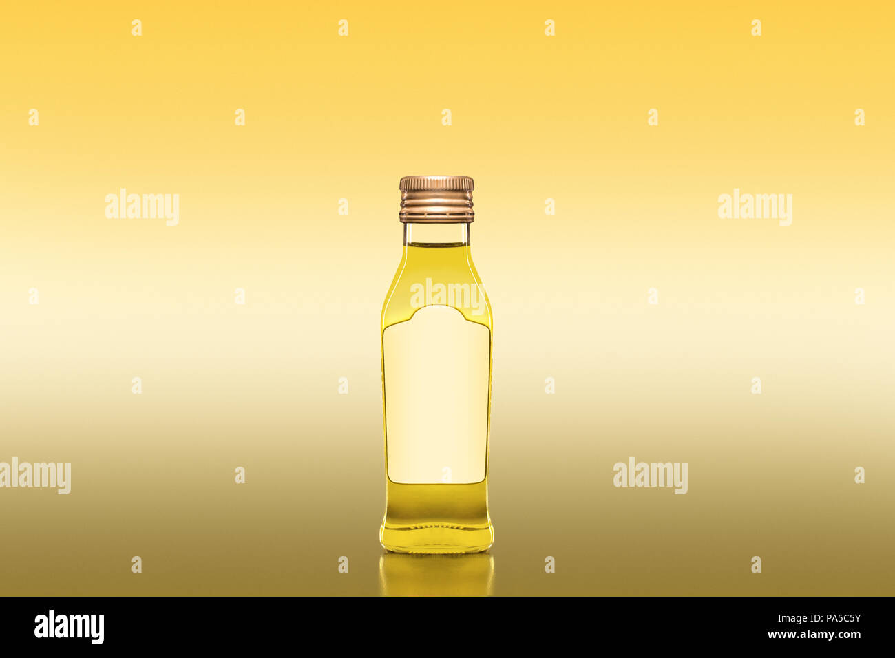 Cooking oil bottle without label on yellow background - commercial ...