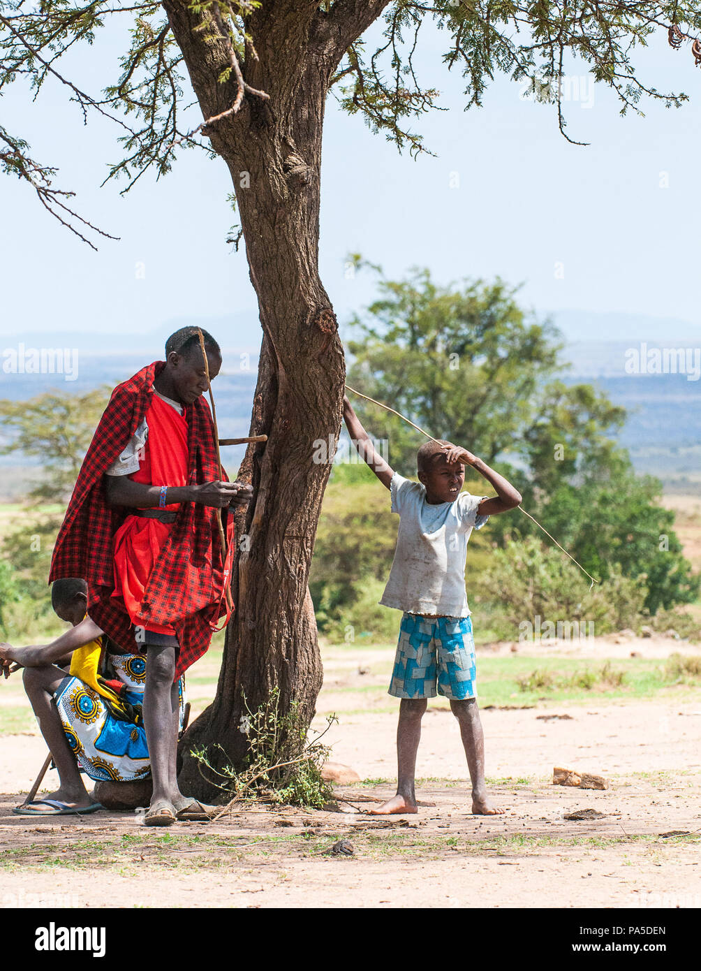 Maasai warrior tree hi-res stock photography and images - Alamy