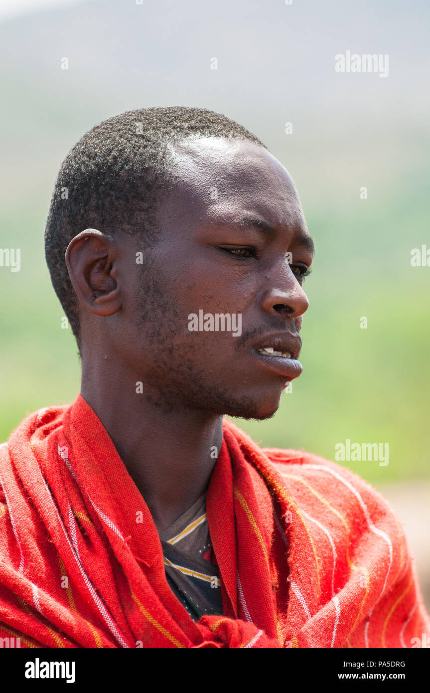 KENYA - OCTOBER 10, 2009: Portrait of an unidentified Massai man in red ...