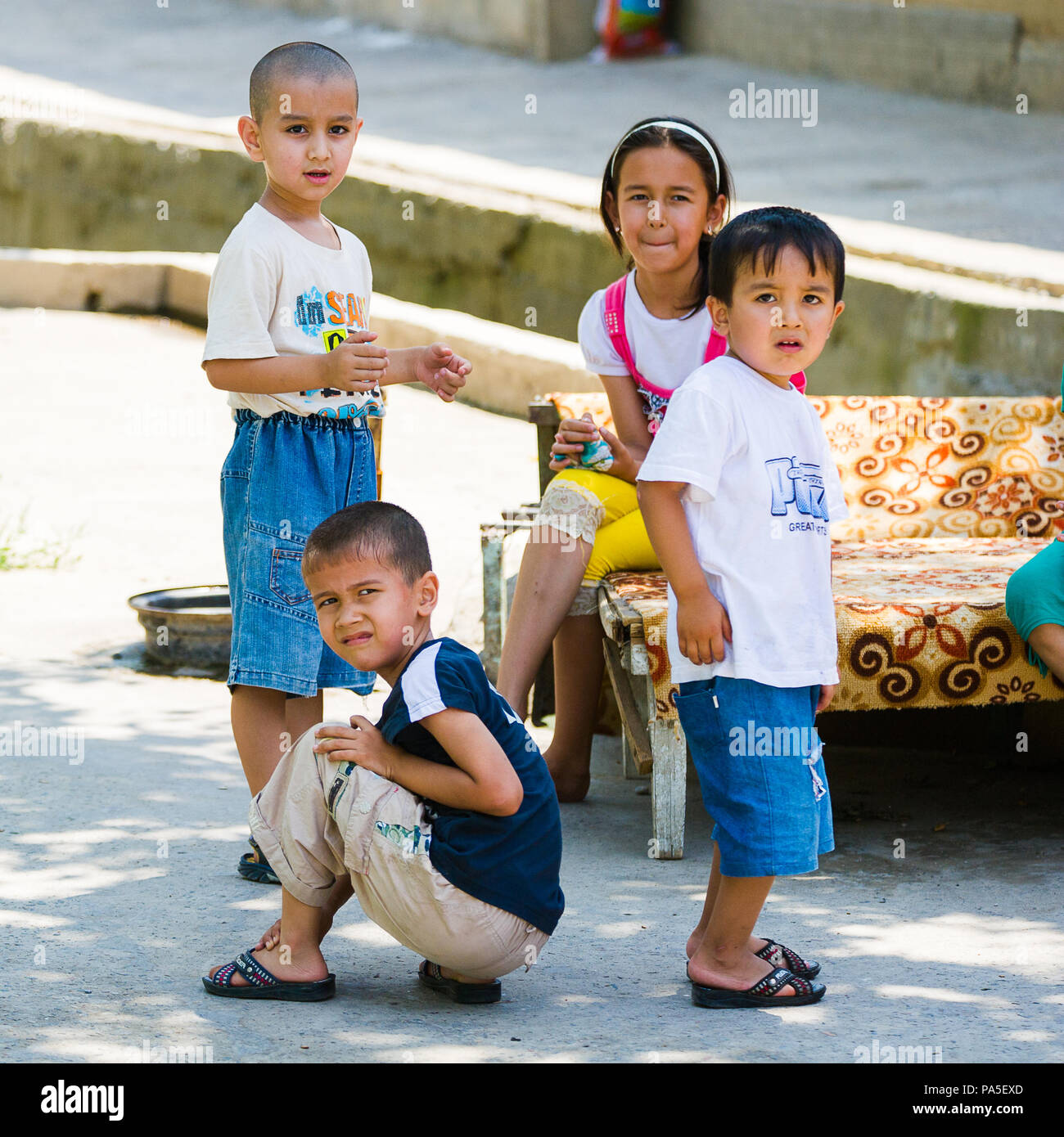TASHKENT, UZBEKISTAN - JUNE 12, 2011: Unidentified Uzbek children play ...