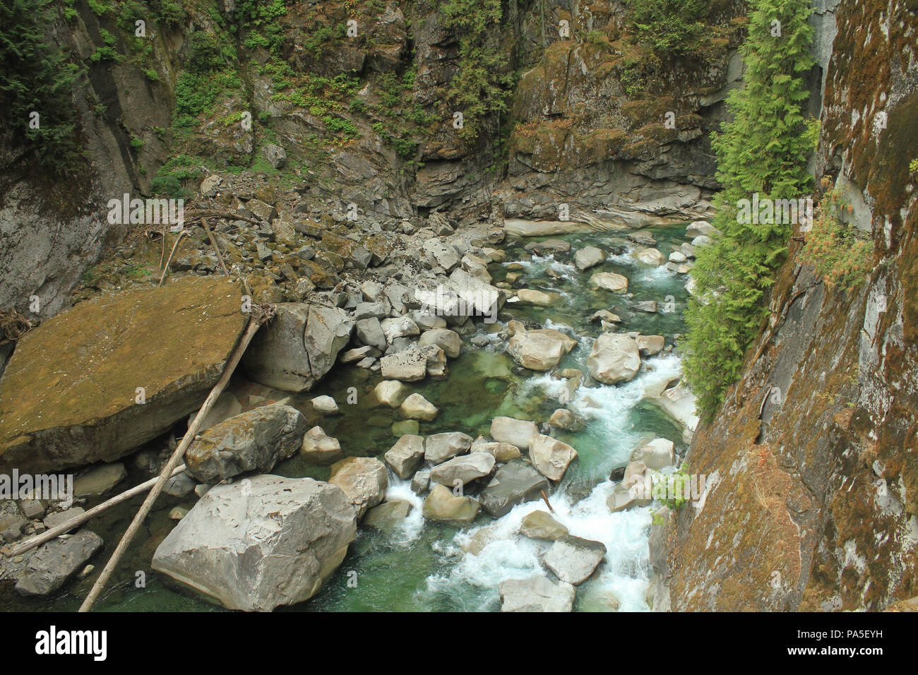 Looking at a river from above at the clear water and rapids Stock Photo ...