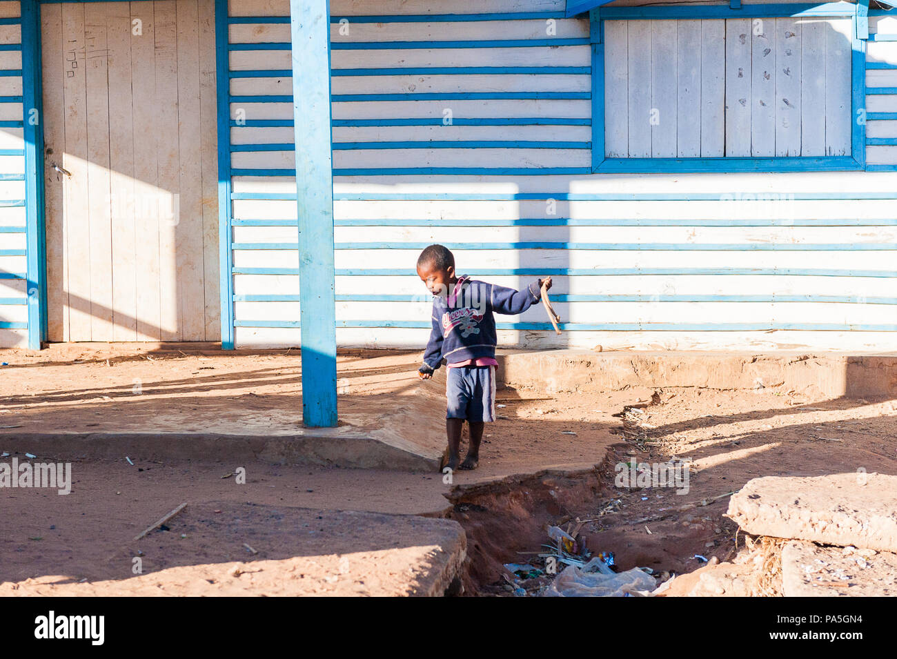 ANTANANARIVO, MADAGASCAR - JULY 3, 2011: Unidentified Madagascar boy ...