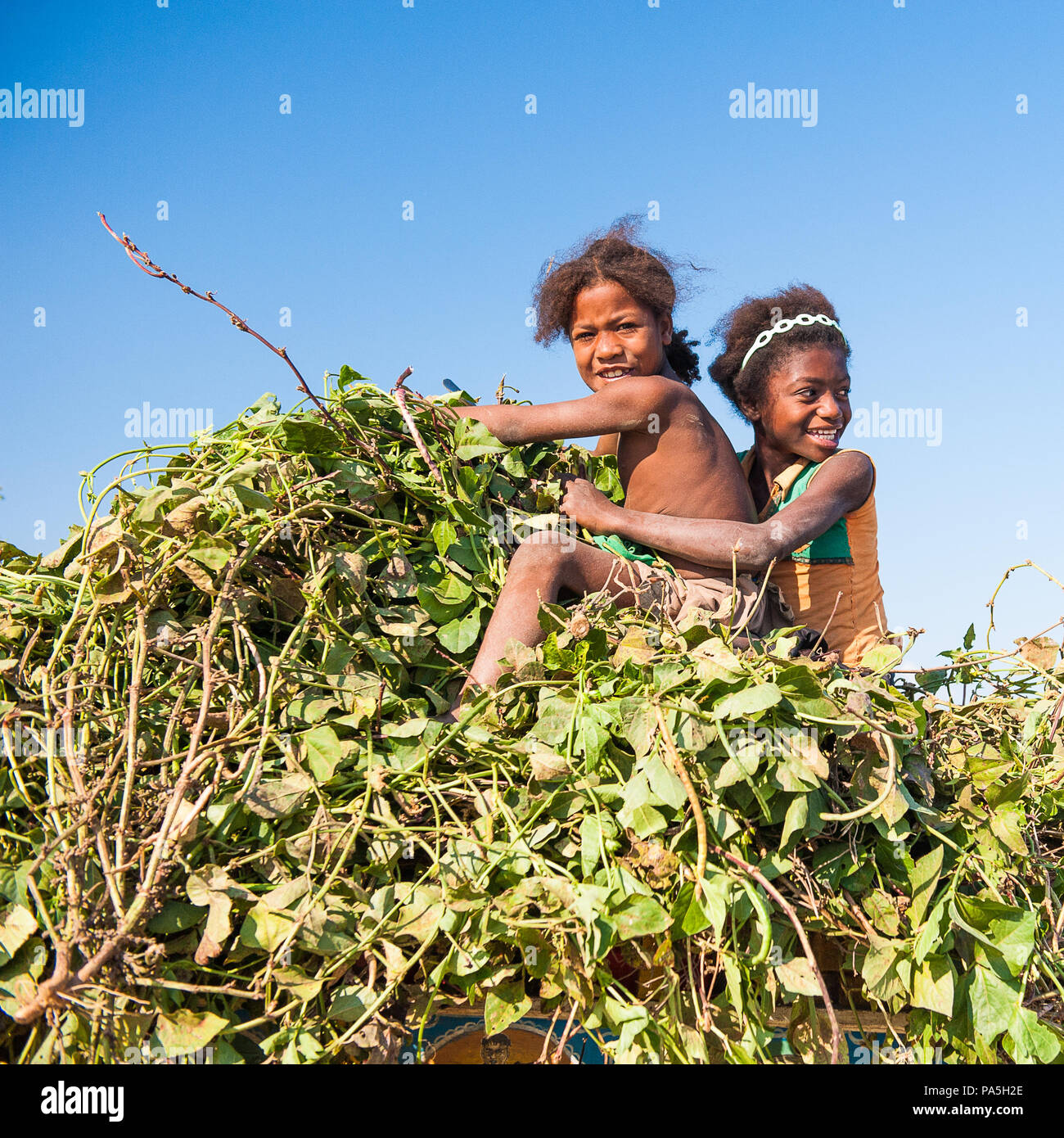 ANTANANARIVO, MADAGASCAR - JULY 3, 2011: Unidentified Madagascar girls ...