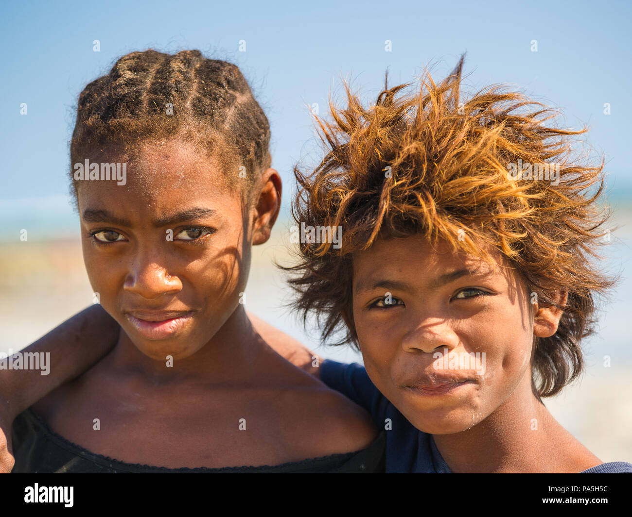MADAGASCAR - JULY 5, 2011: Portrait of an unidentified brother and ...