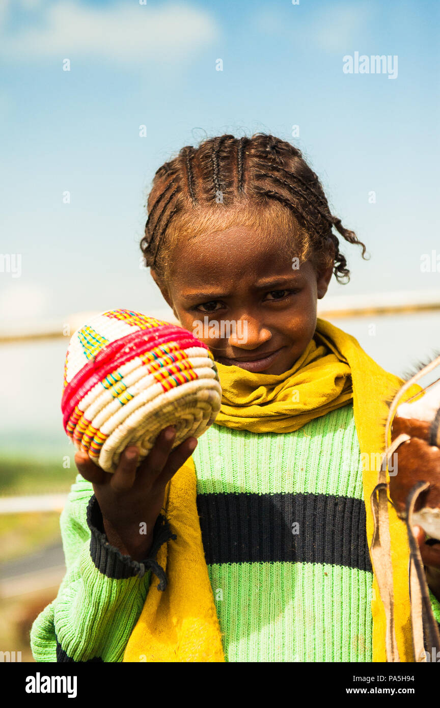 OMO, ETHIOPIA - SEPTEMBER 19, 2011: Unidentified Ethiopian shy ...