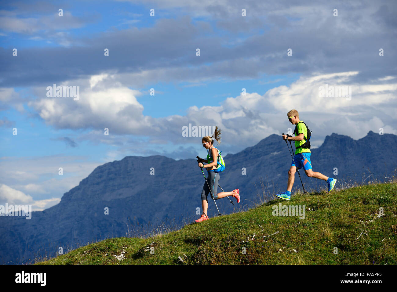 Hikers, Trail running on the Eggenalm, behind Loferer Steinberge, Reit ...