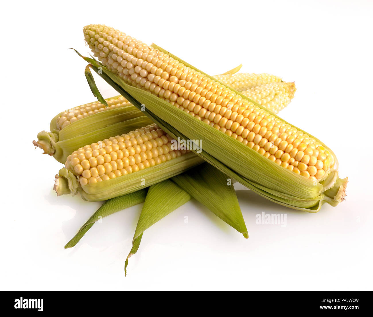 fresh corn fruits with green leaves isolated on white background Stock ...