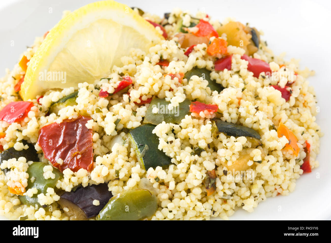 Couscous with vegetables isolated on white background Stock Photo - Alamy