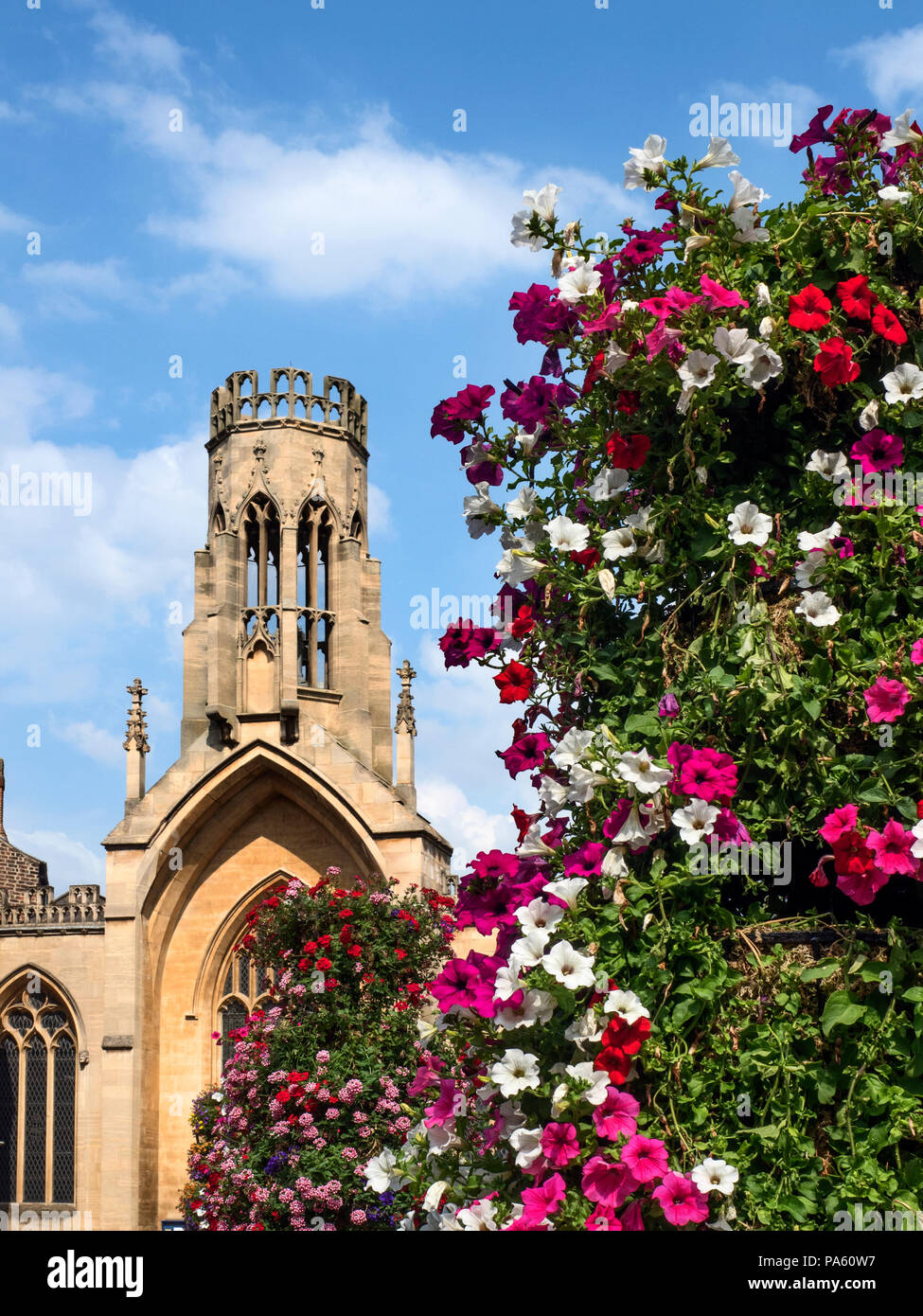 Summer flower display and tower of St Helens Stonegate in St Helens ...