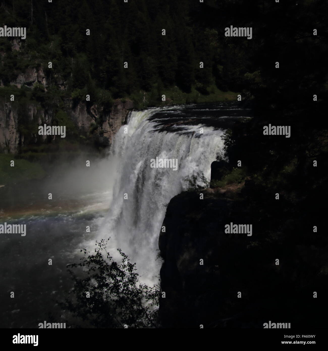 Partial silhouette of Mesa Falls, Island Park Idaho USA highlighting ...
