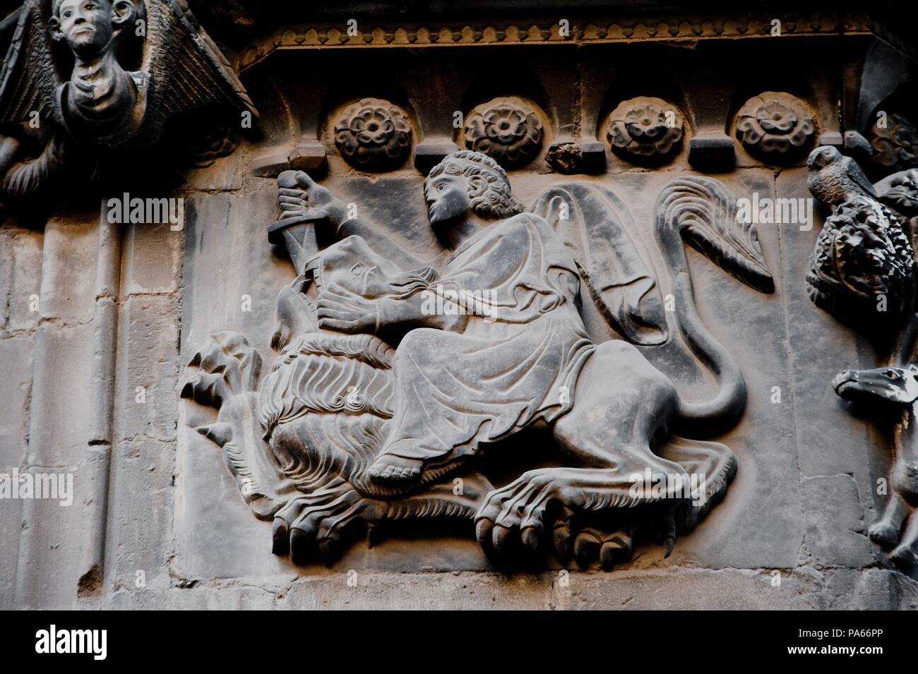 "Samson killing a lion (probably)", 14th century, sculptural relief ...