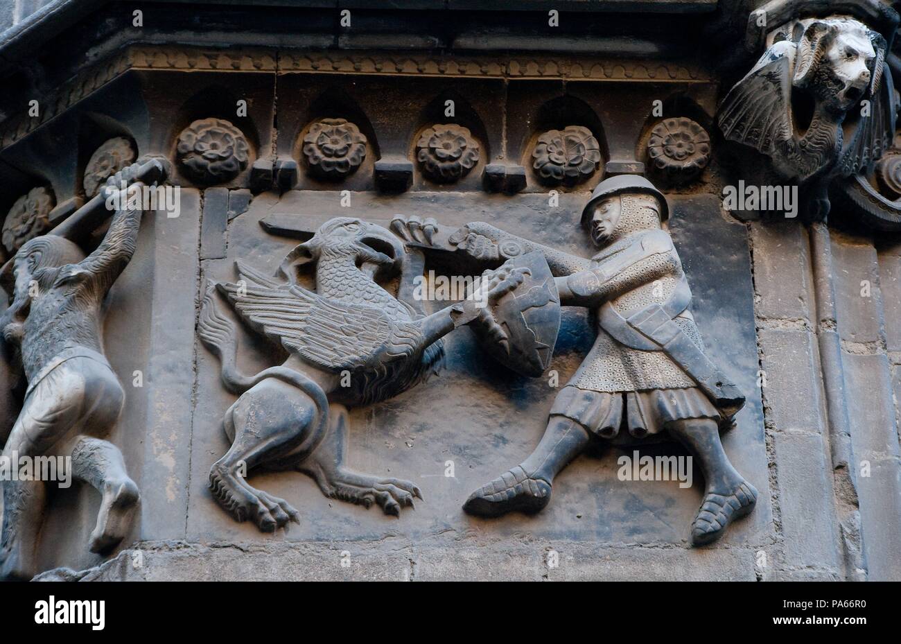 "Fight between a man and a griffin", 14th century, Sculptural relief ...
