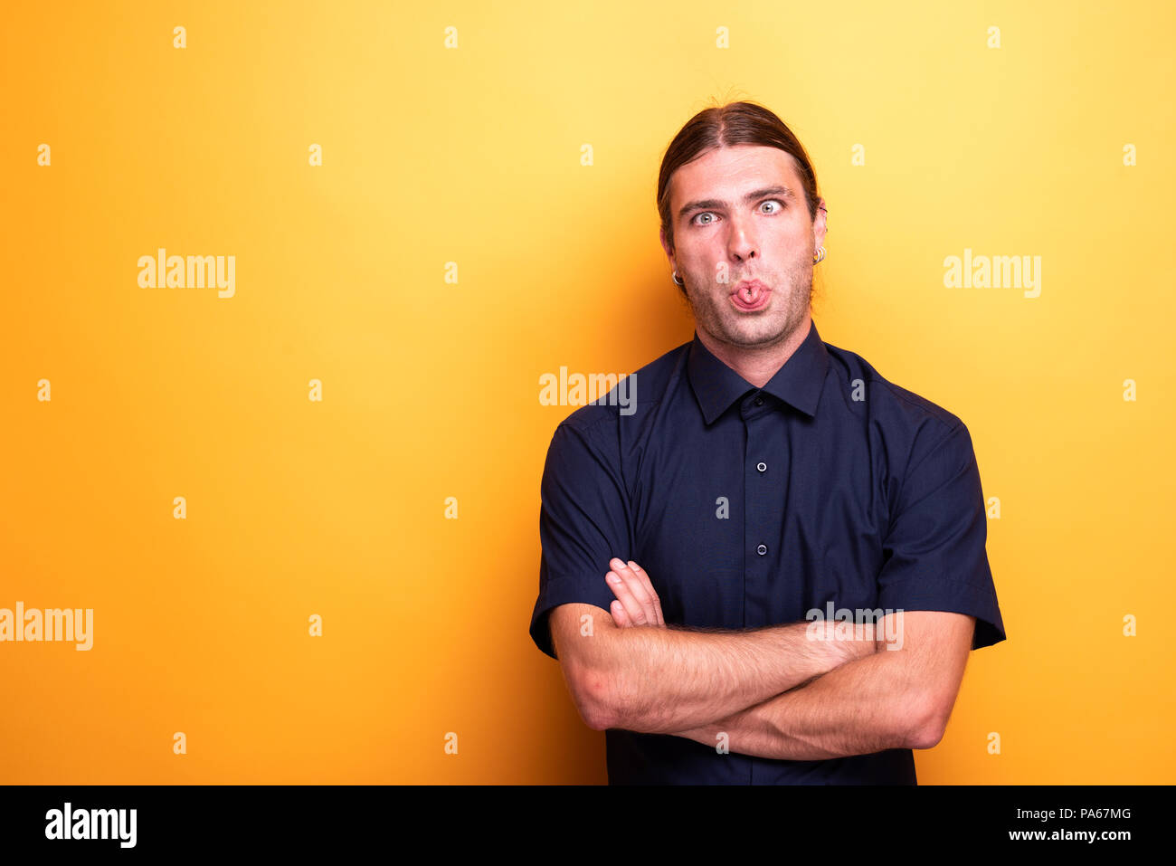 Hilarious male faces posing Stock Photo - Alamy