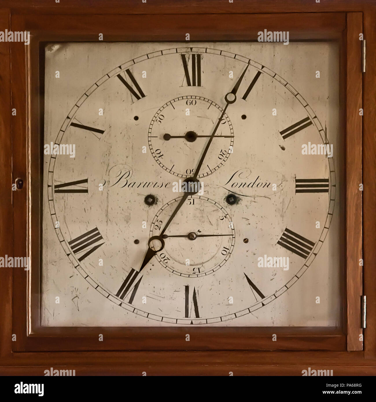 A photography of an old clock in a wooden frame Stock Photo - Alamy