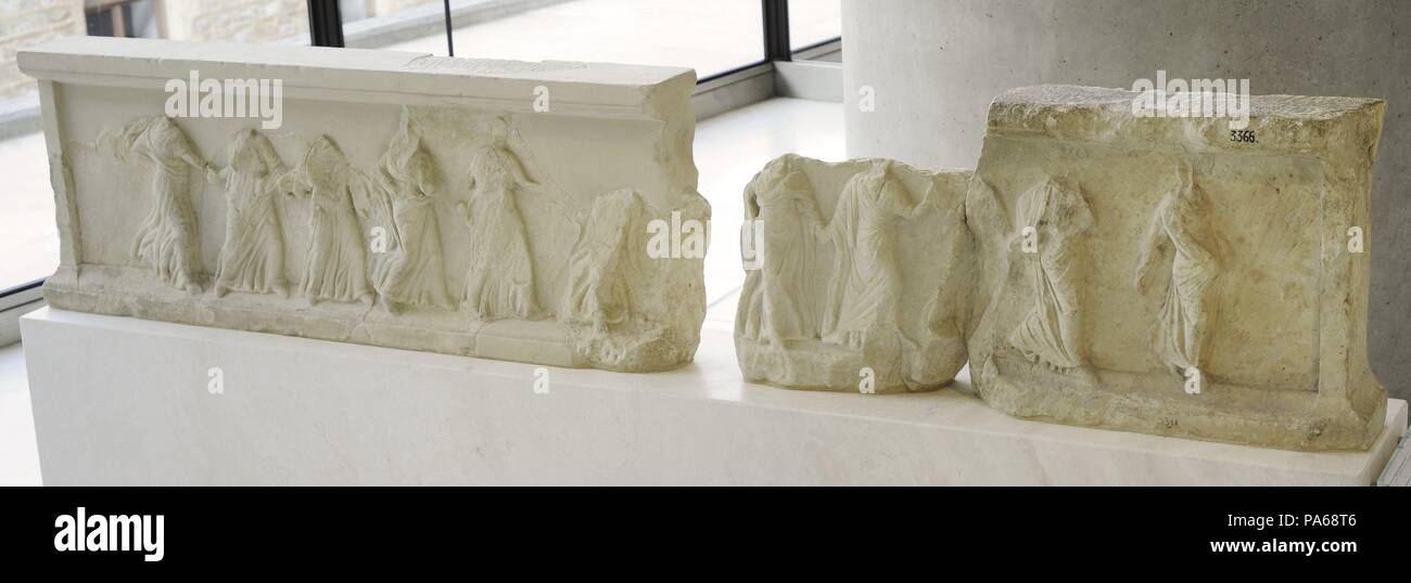 Revetement from the base of a dedication. The revetement depicts eleven ...
