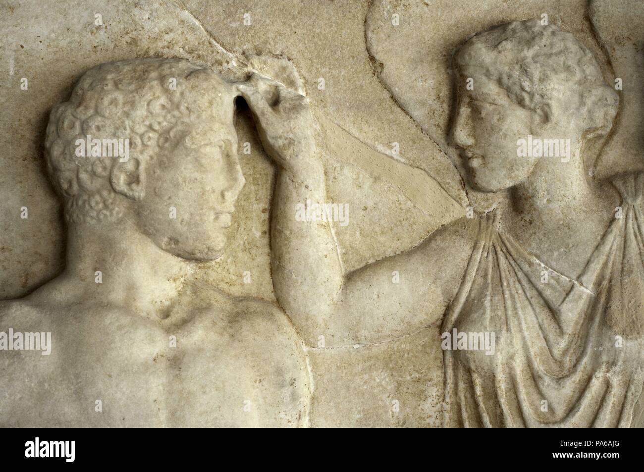 Dedication. A winged Nike crowns Herakles or a victorious athlete ...