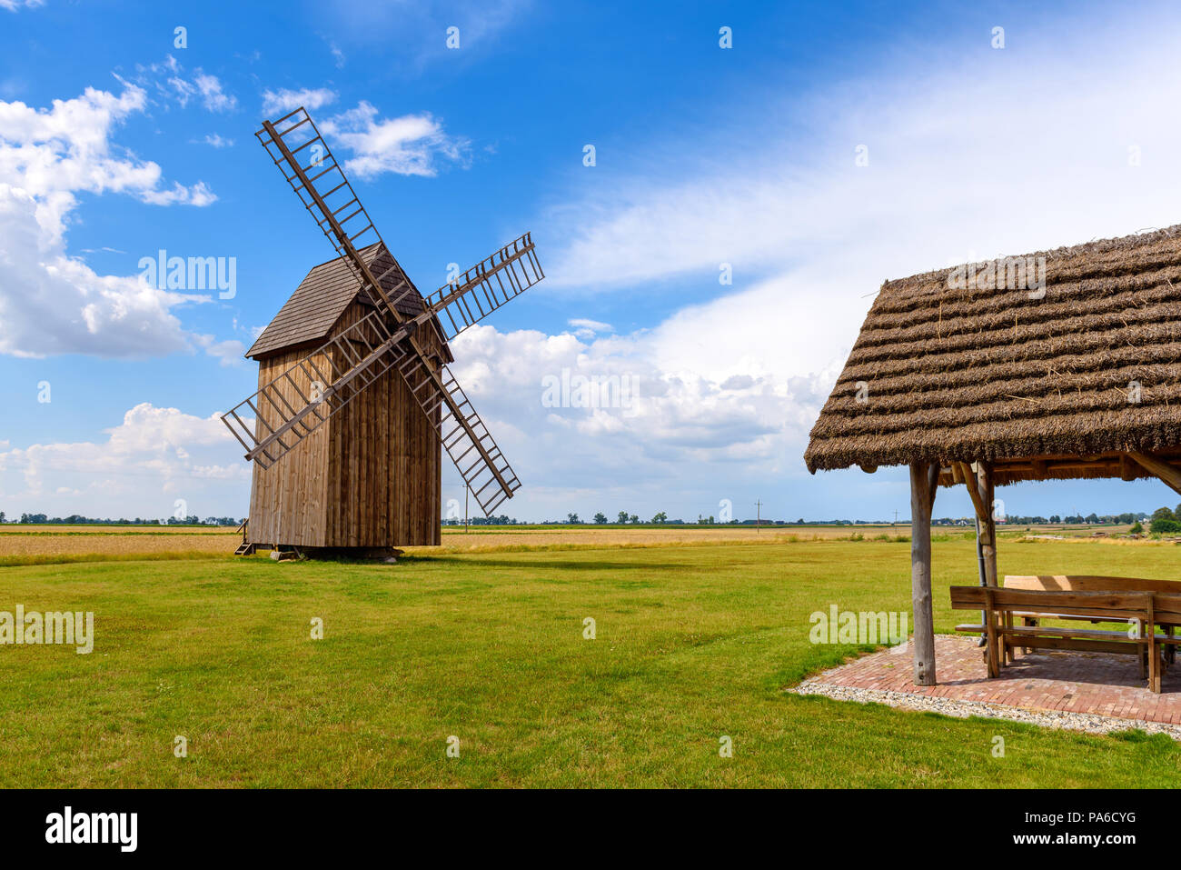 Traditional wooden windmill on field in Poland Stock Photo - Alamy