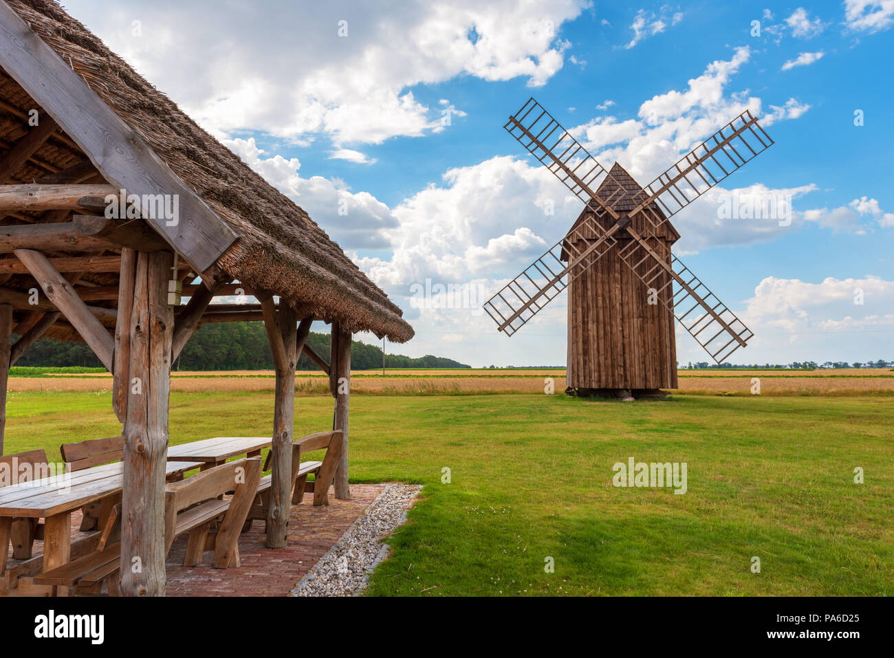 Traditional wooden windmill on field in Poland Stock Photo - Alamy