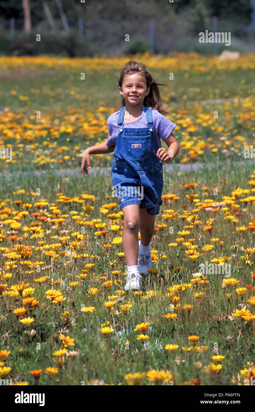 Little Girl Running In Field
