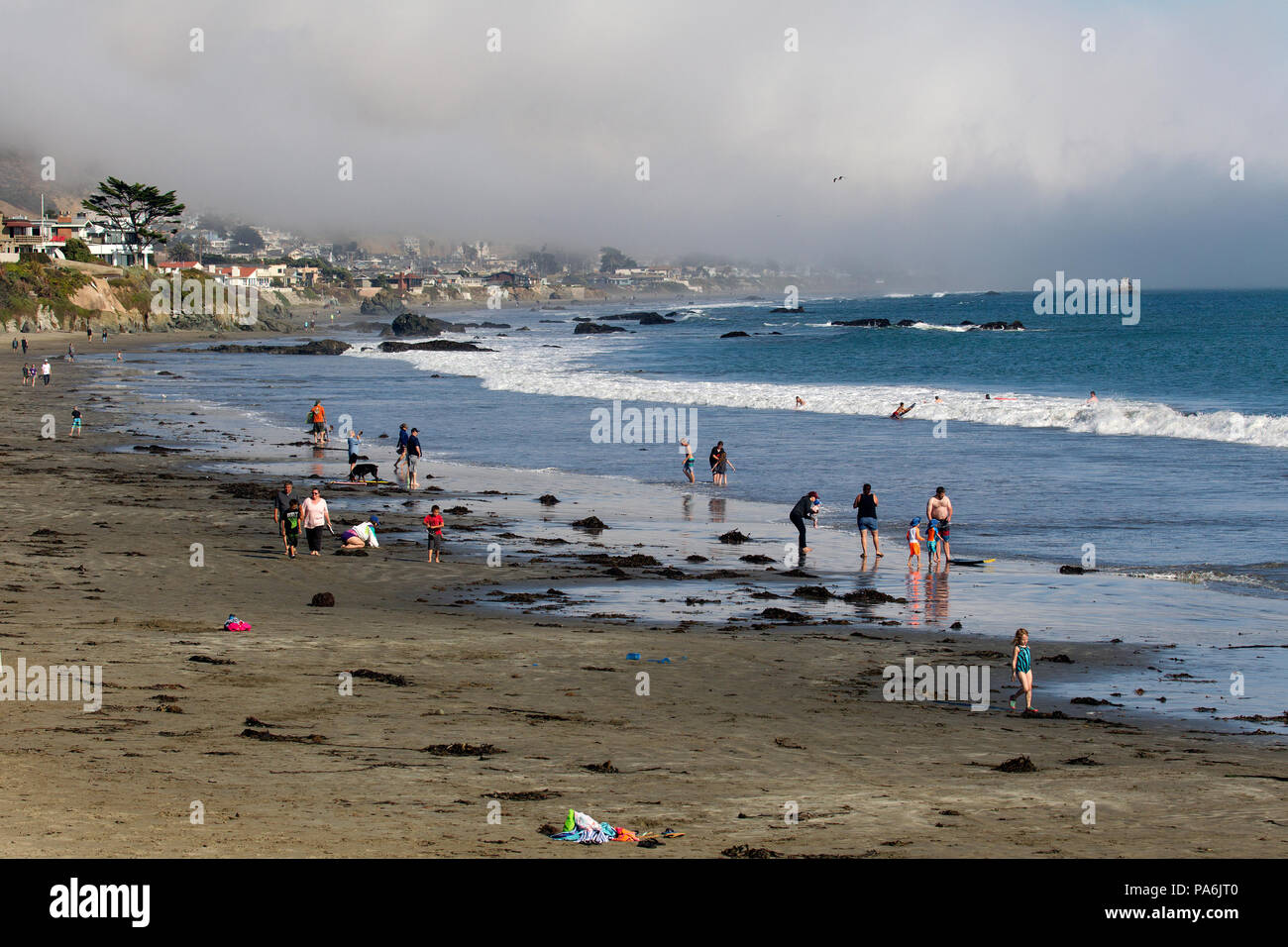 Families on Beach Stock Photo - Alamy