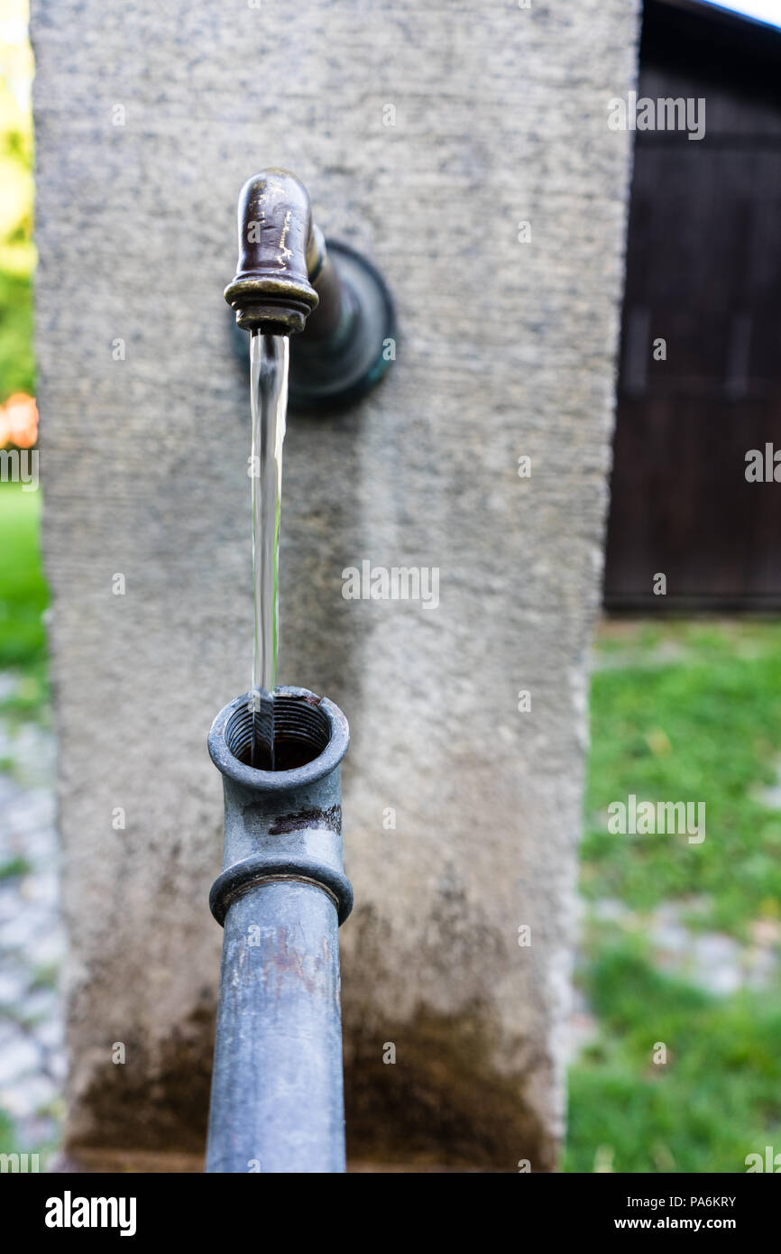 fountain water metal pipe construction maintenance pipe Stock Photo - Alamy