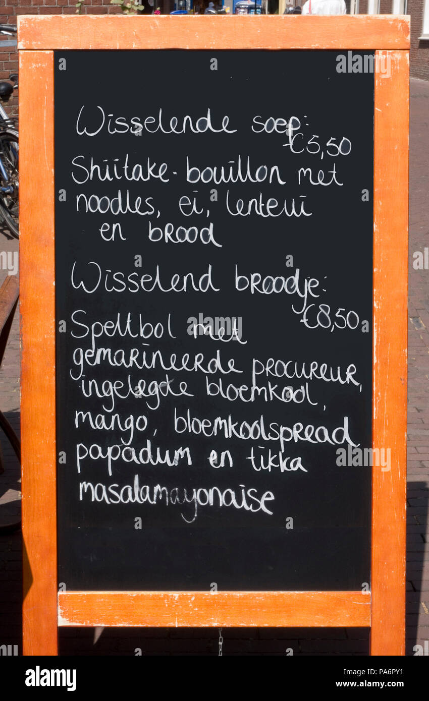 Outdoors menu sign for typical Dutch food ,written in Dutch language ...