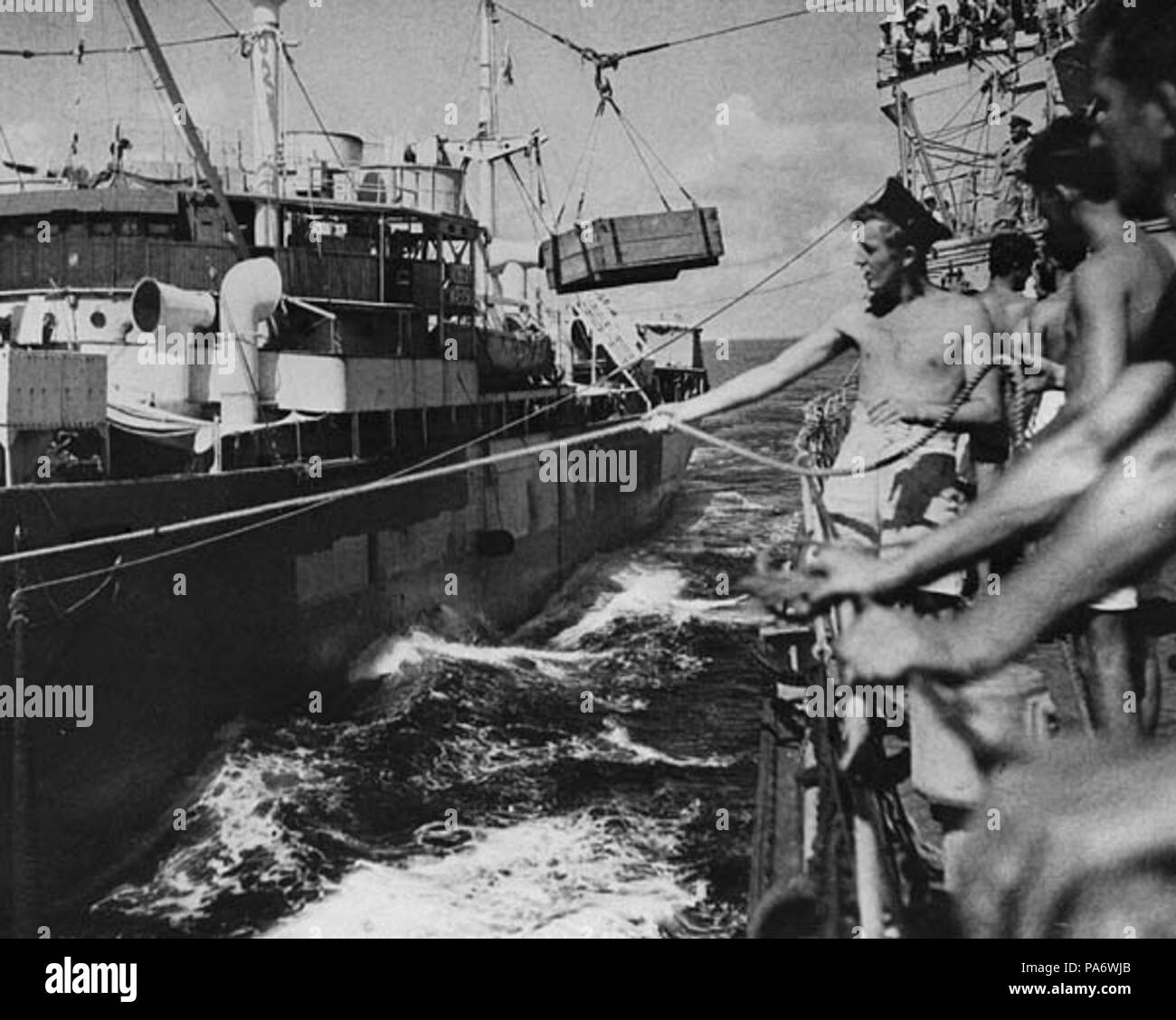 18 Ammunitioning HMCS Uganda at sea June 1945 LAC 3191648 Stock Photo ...