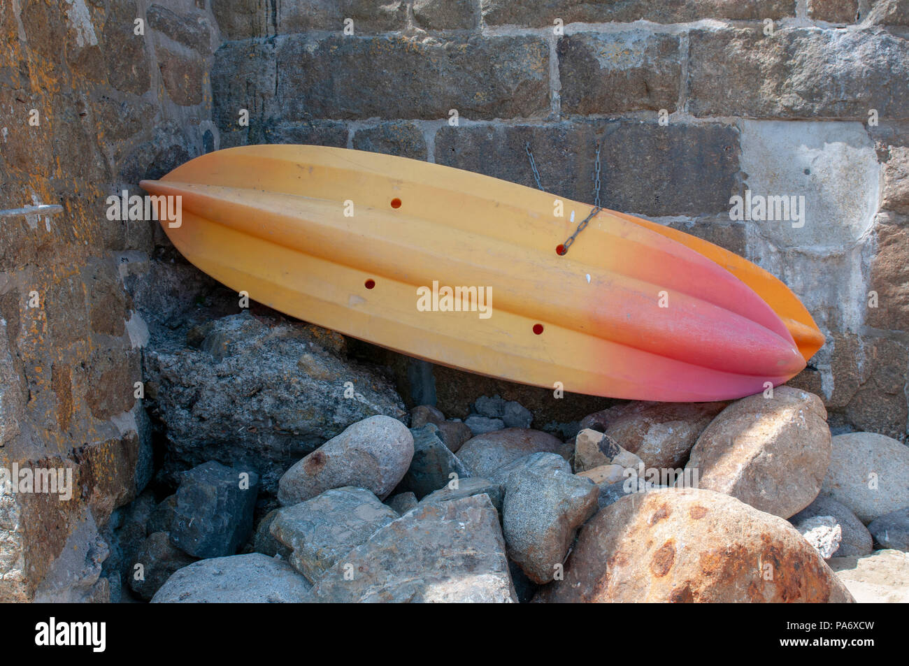 Canoes, kayak etc. in Mousehole, Cornwall UK Stock Photo - Alamy