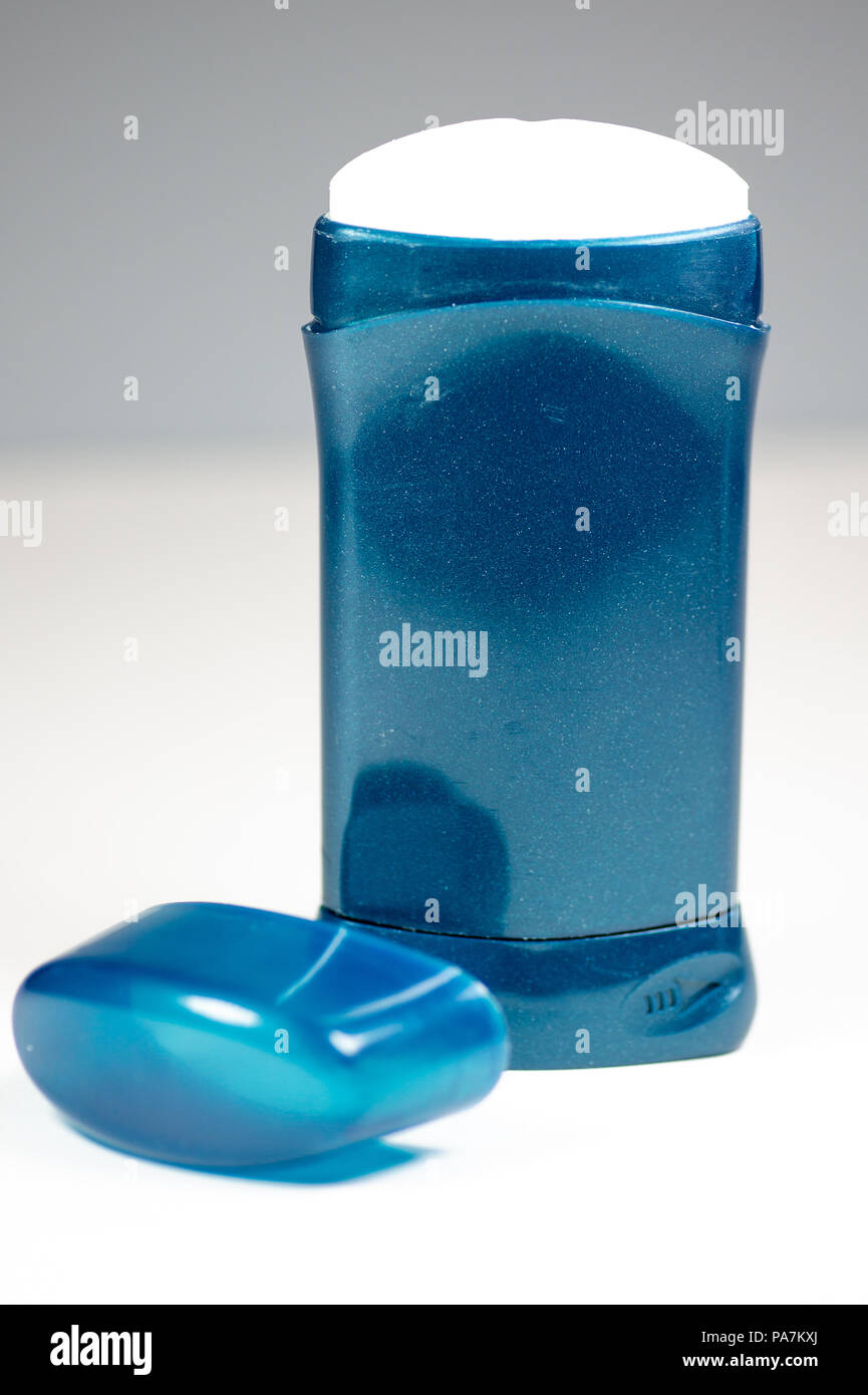 A blue deodorant stick on a white surface Stock Photo - Alamy